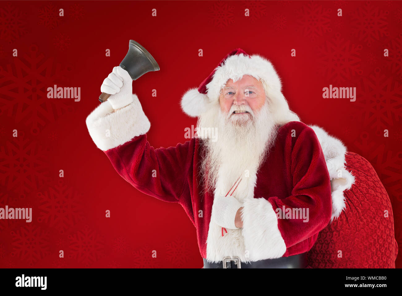 Happy santa ringing a bell against red background Stock Photo - Alamy