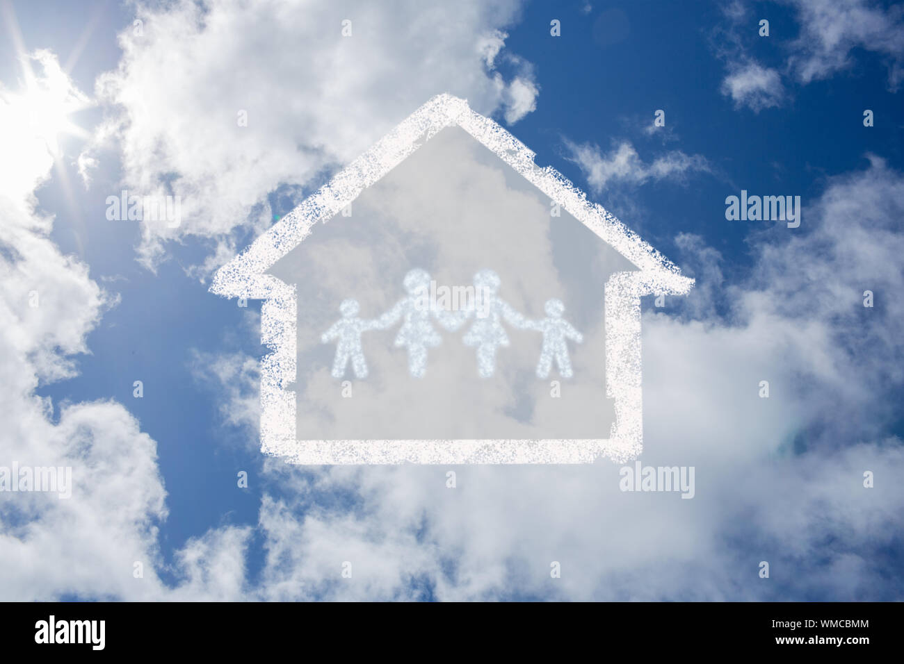Cloud in shape of family against bright blue sky with clouds Stock ...