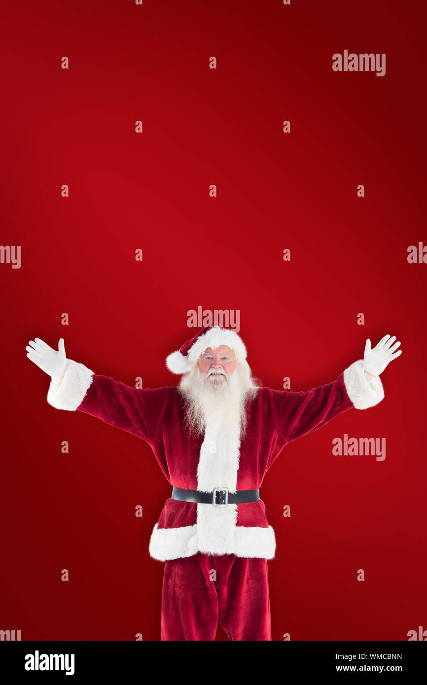 Jolly Santa opens his arms to camera against red background Stock Photo ...
