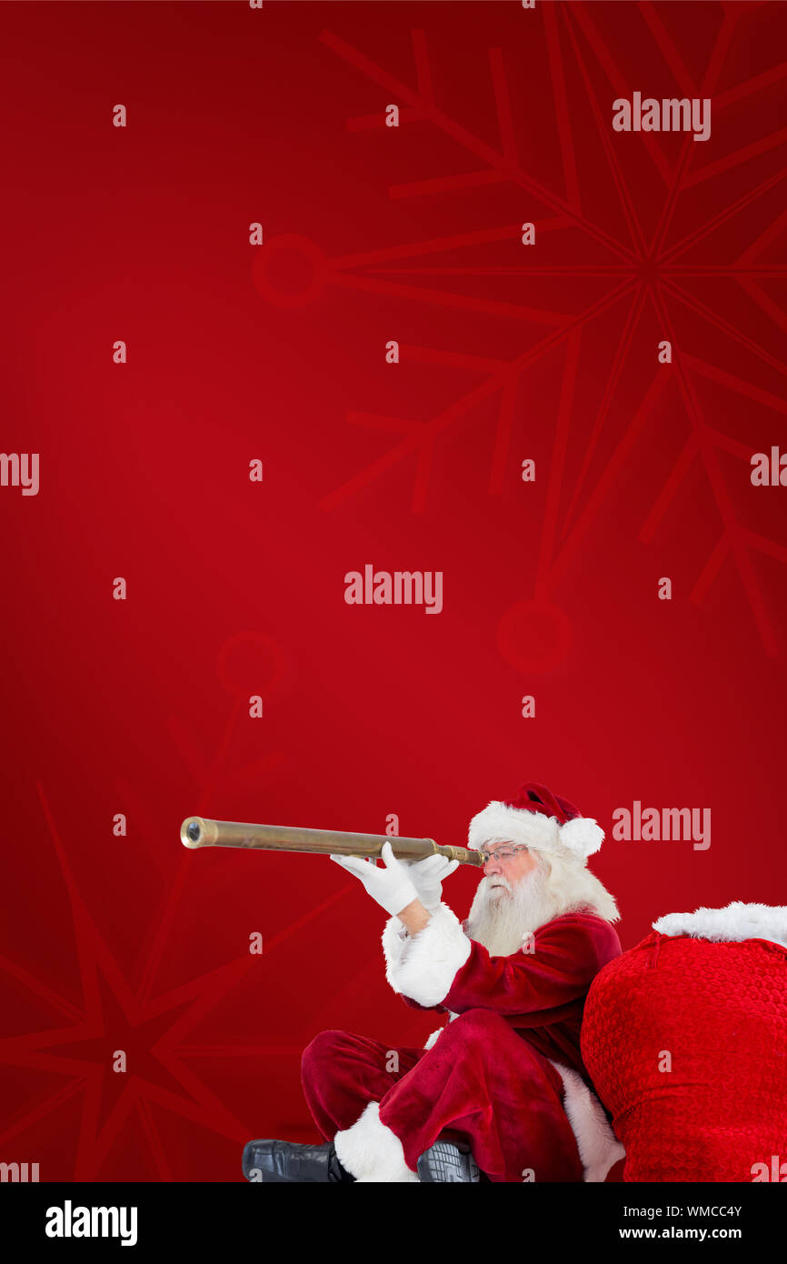 Santa claus looking through telescope against red background Stock ...
