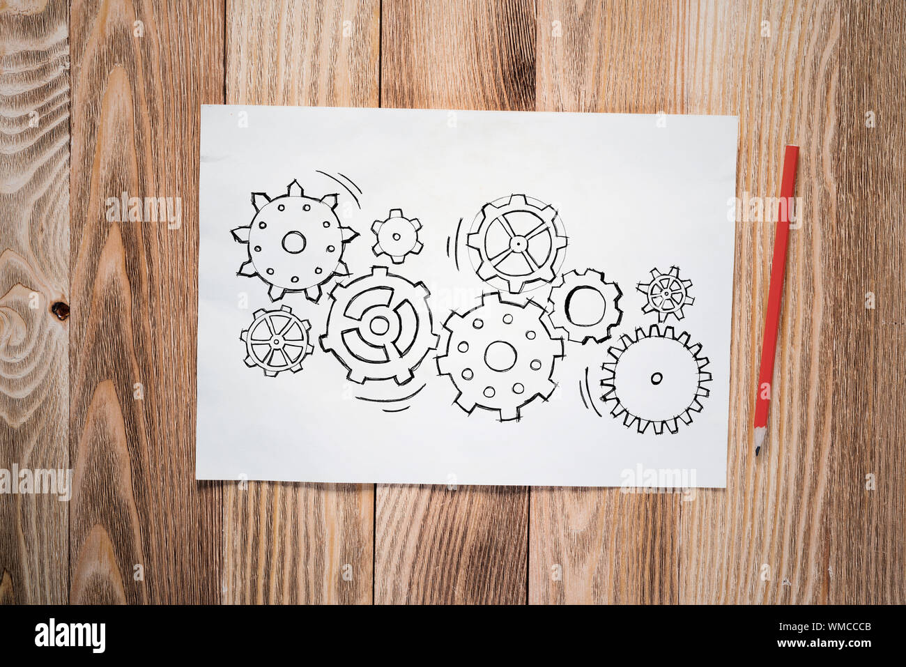 Cogwheels hand drawn illustration on paper sheet. Industry mechanism ... Cogwheels hand drawn illustration on paper sheet. Industry mechanism ...