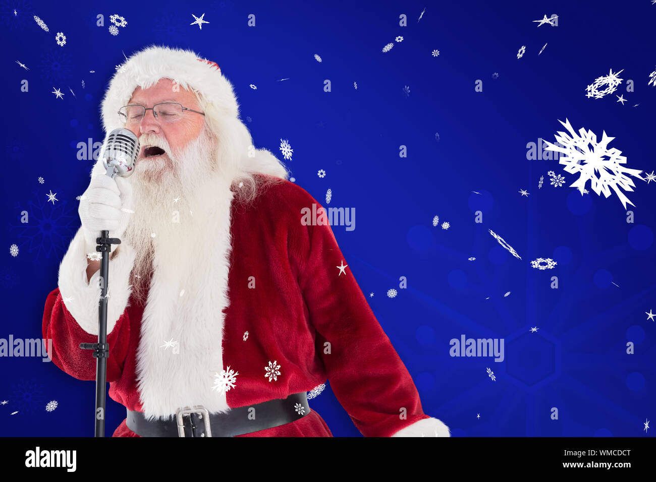 Santa Claus is singing Christmas songs against blue snowflake ...