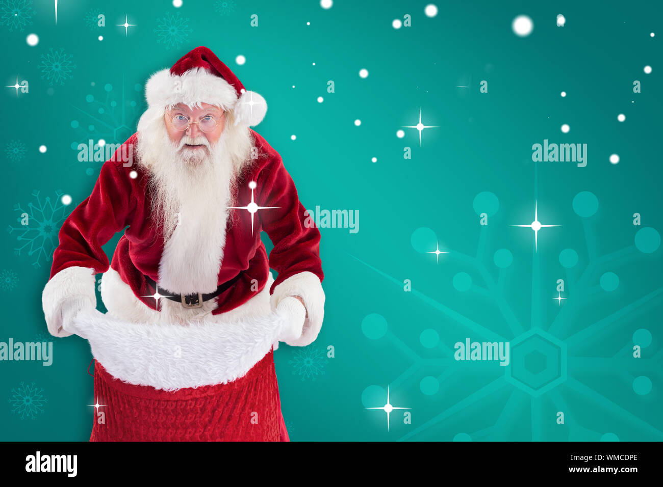 Santa open his red bag against green snowflake background Stock Photo ...