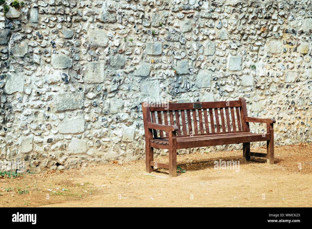 Wooden Bench Against Wall High Resolution Stock Photography and Images ...