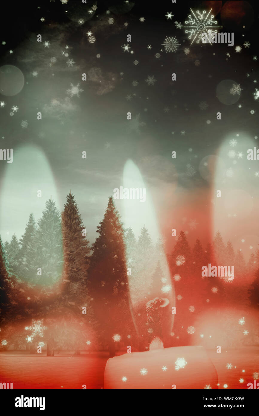 Snow falling against candle burning against festive background Stock ...