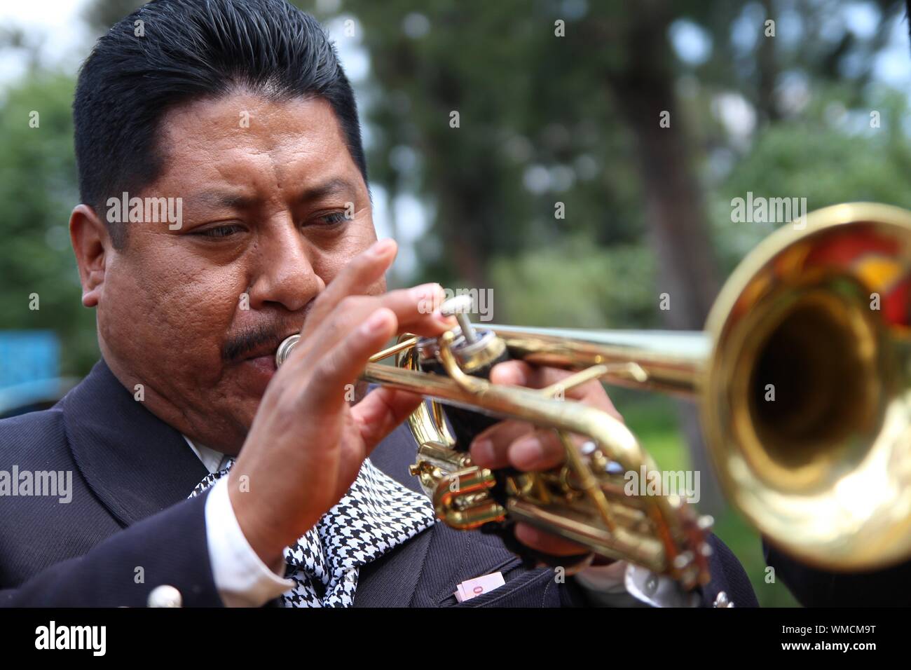 Playing instrument hi-res stock photography and images - Alamy