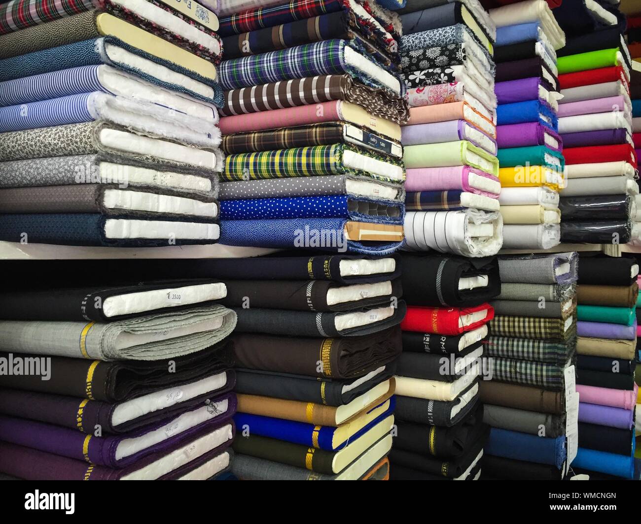 Textile industry stack fabric hi-res stock photography and images - Alamy