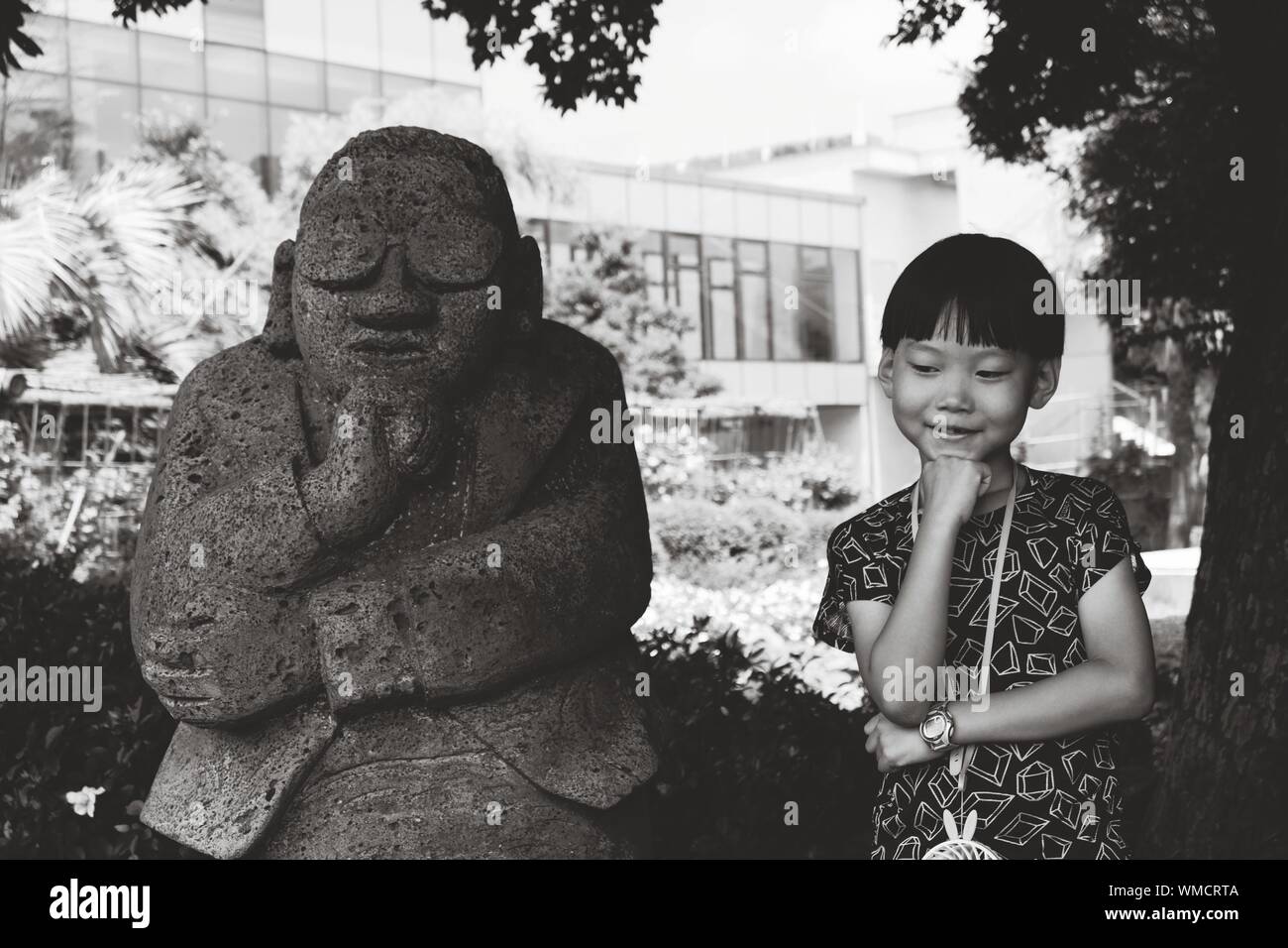 Stone boy statue hi-res stock photography and images - Alamy