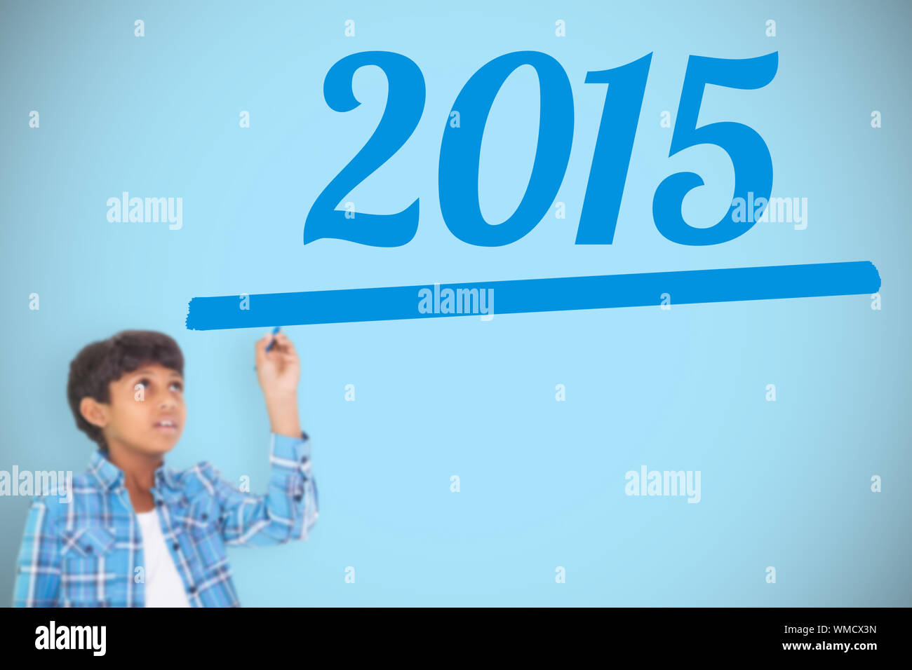 Cute boy smiling and writing against blue background with vignette ...