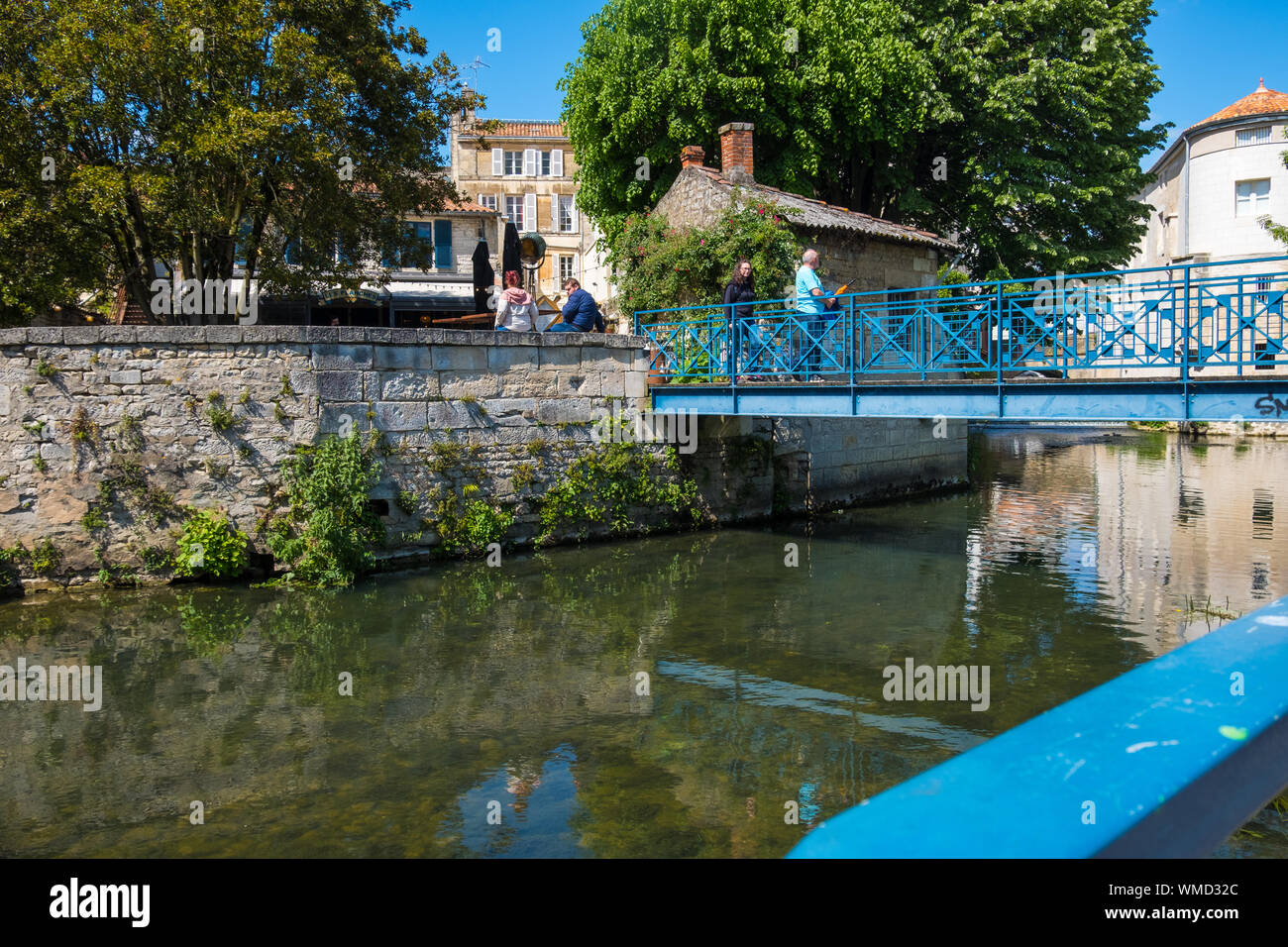 Niort, France - May 11, 2019: The quay of Sevres river in Old Town of ...