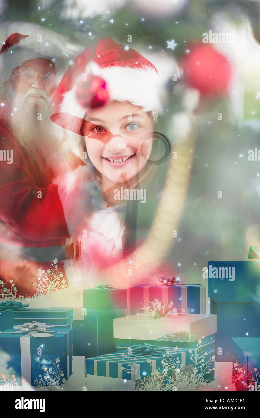 santa writing his list against snow falling Stock Photo - Alamy