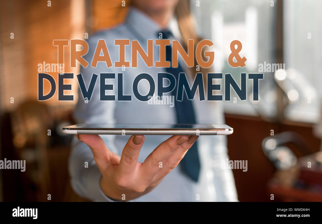 Writing note showing Training And Development. Business concept for ...