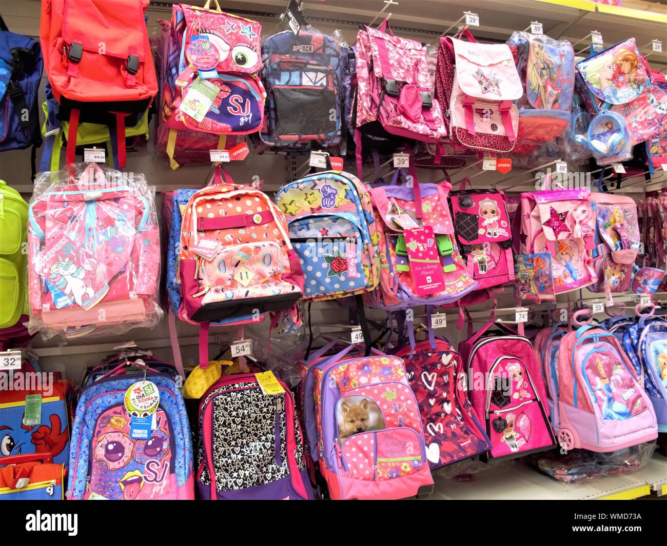 COLORFUL SCHOOL BACKPACKS INSIDE IN THE SUPERMARKET Stock Photo - Alamy