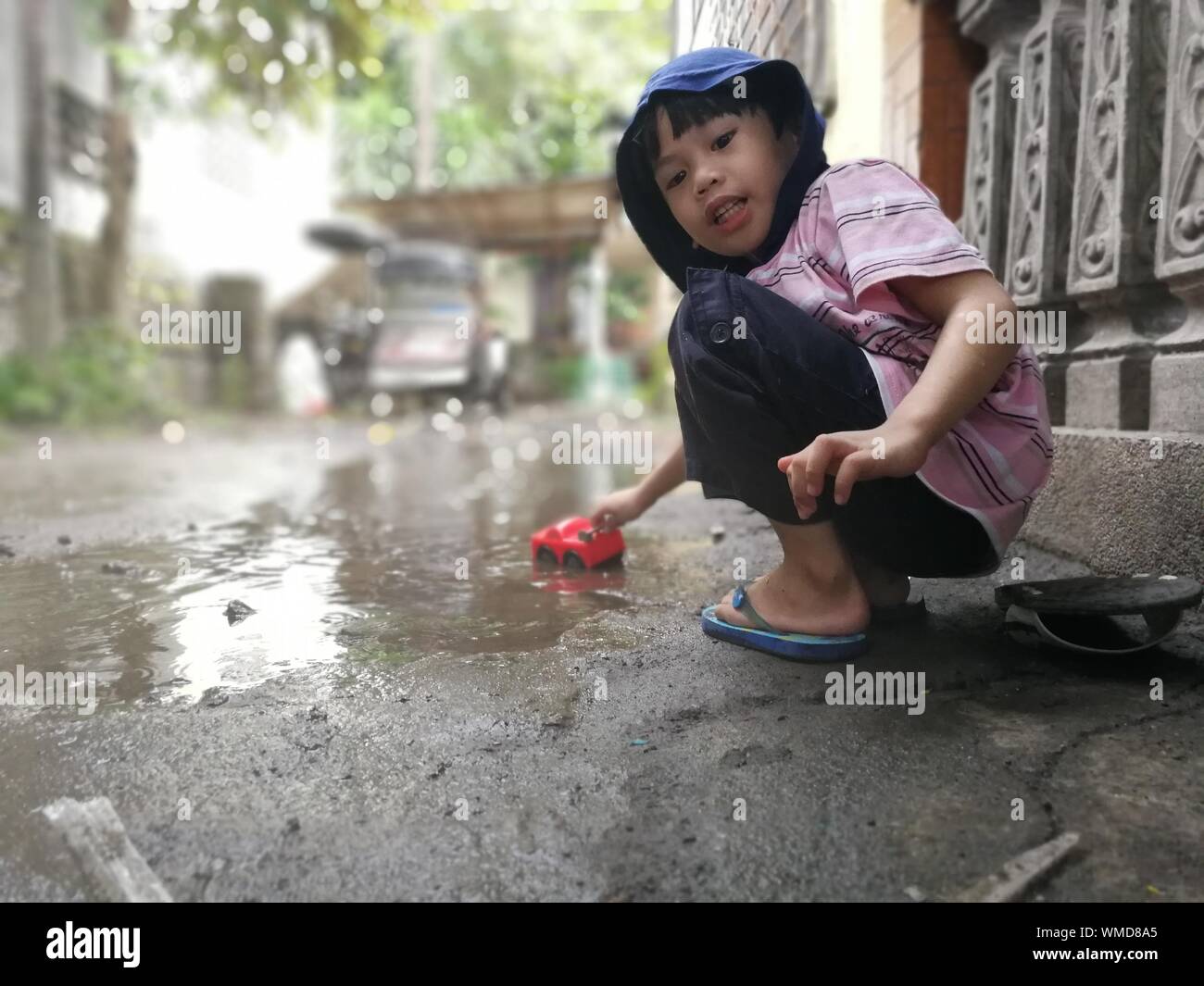 Car puddle person hi-res stock photography and images - Alamy