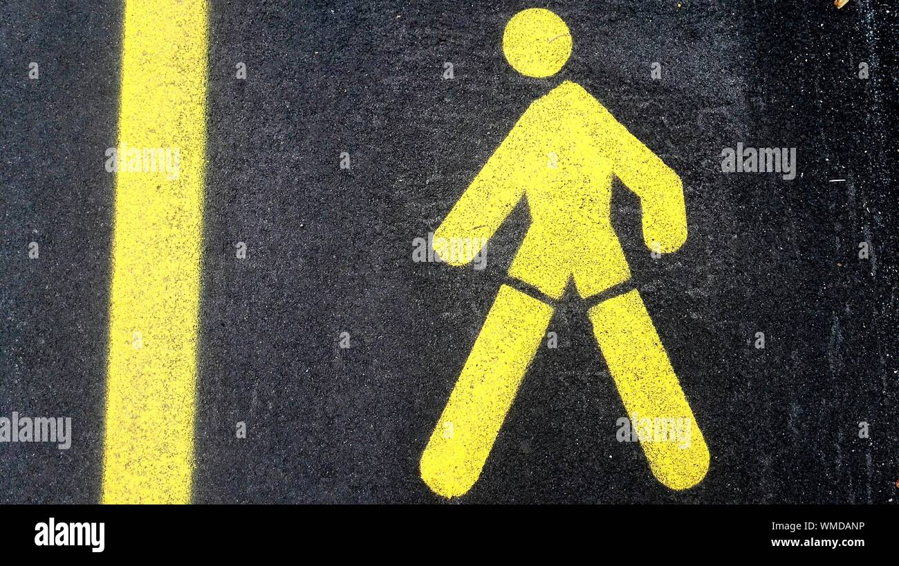 Yellow pedestrian crossing sign hi-res stock photography and images - Alamy