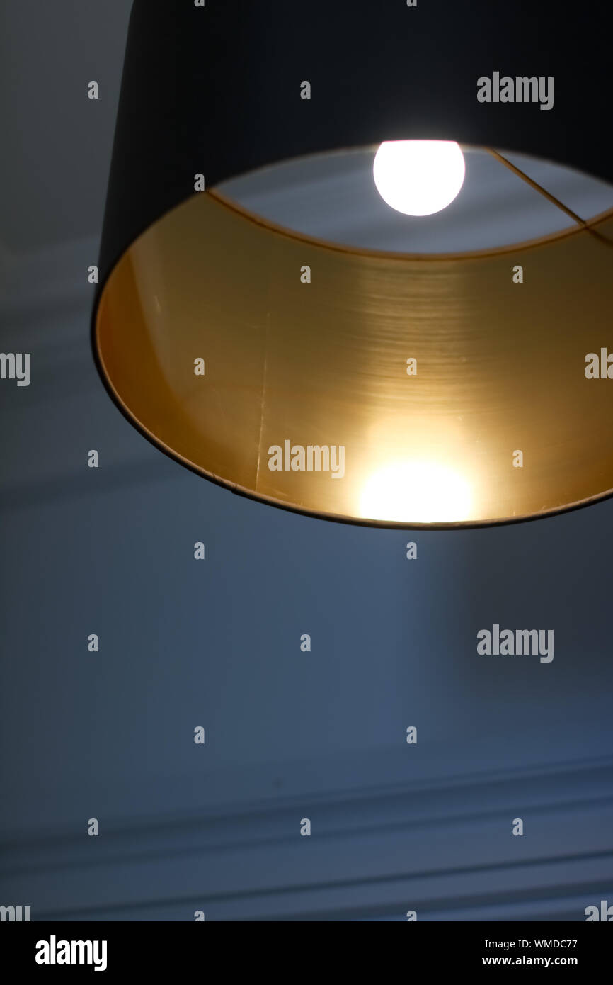 Interior design, indoor lamps and electricity concept - Golden lamp in ...