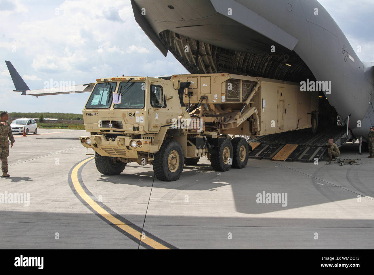 MIHAIL KOGALNICEANU (MK) AIR BASE, ROMANIA - American troops load a ...