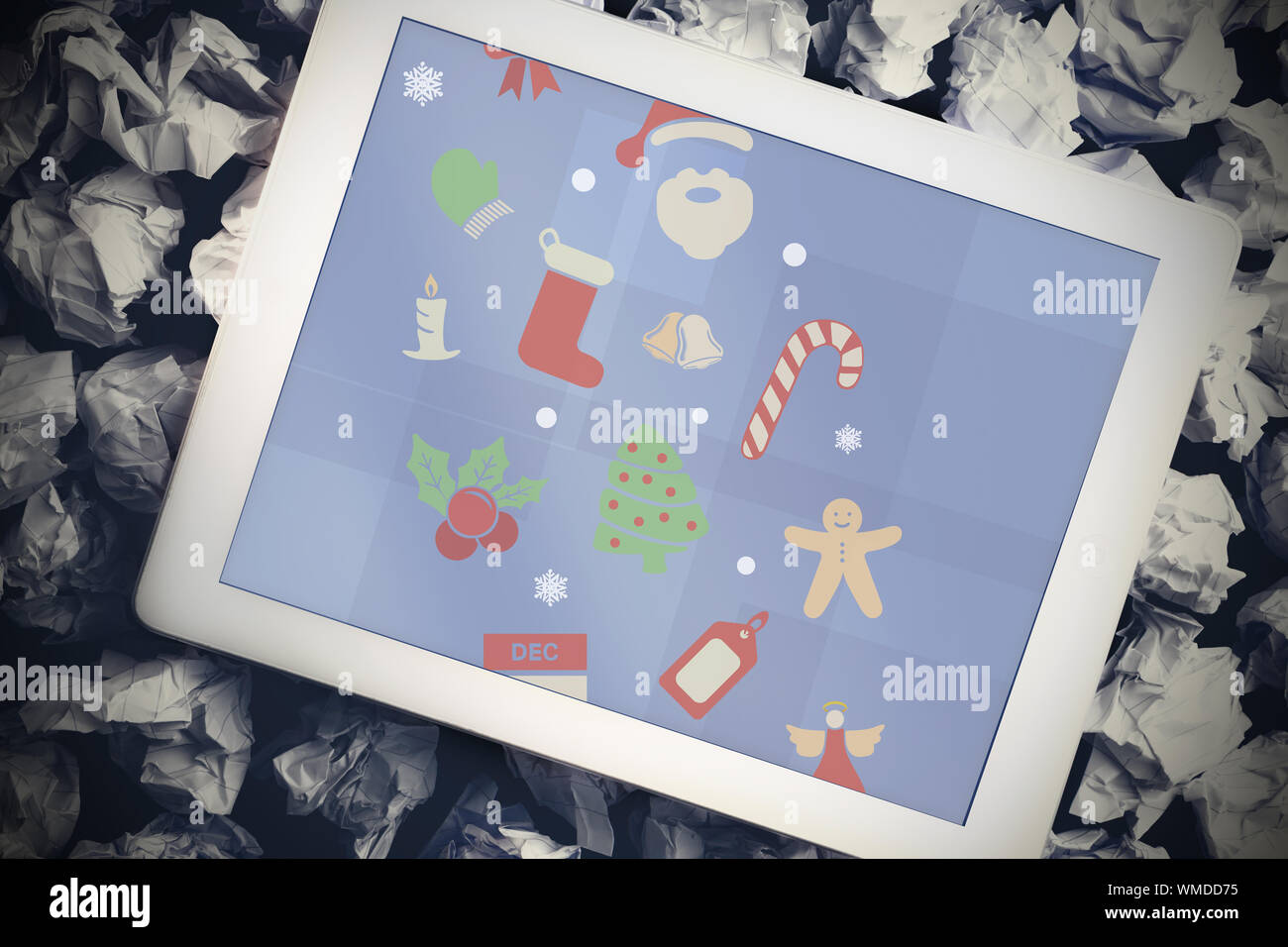 Christmas graphics against tablet pc with blue screen Stock Photo - Alamy