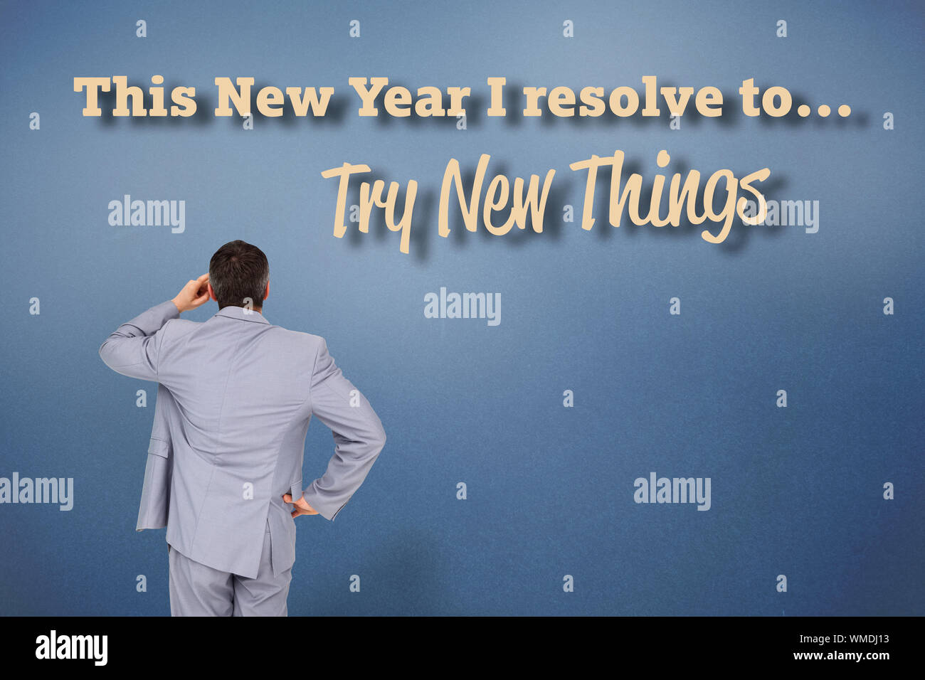 Thinking businessman against blue background with vignette Stock Photo ...