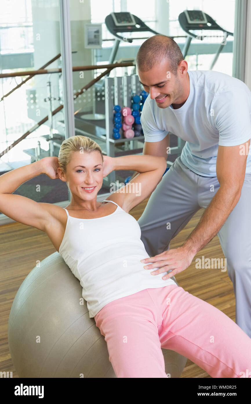 Woman crunches looking at camera hi-res stock photography and images ...