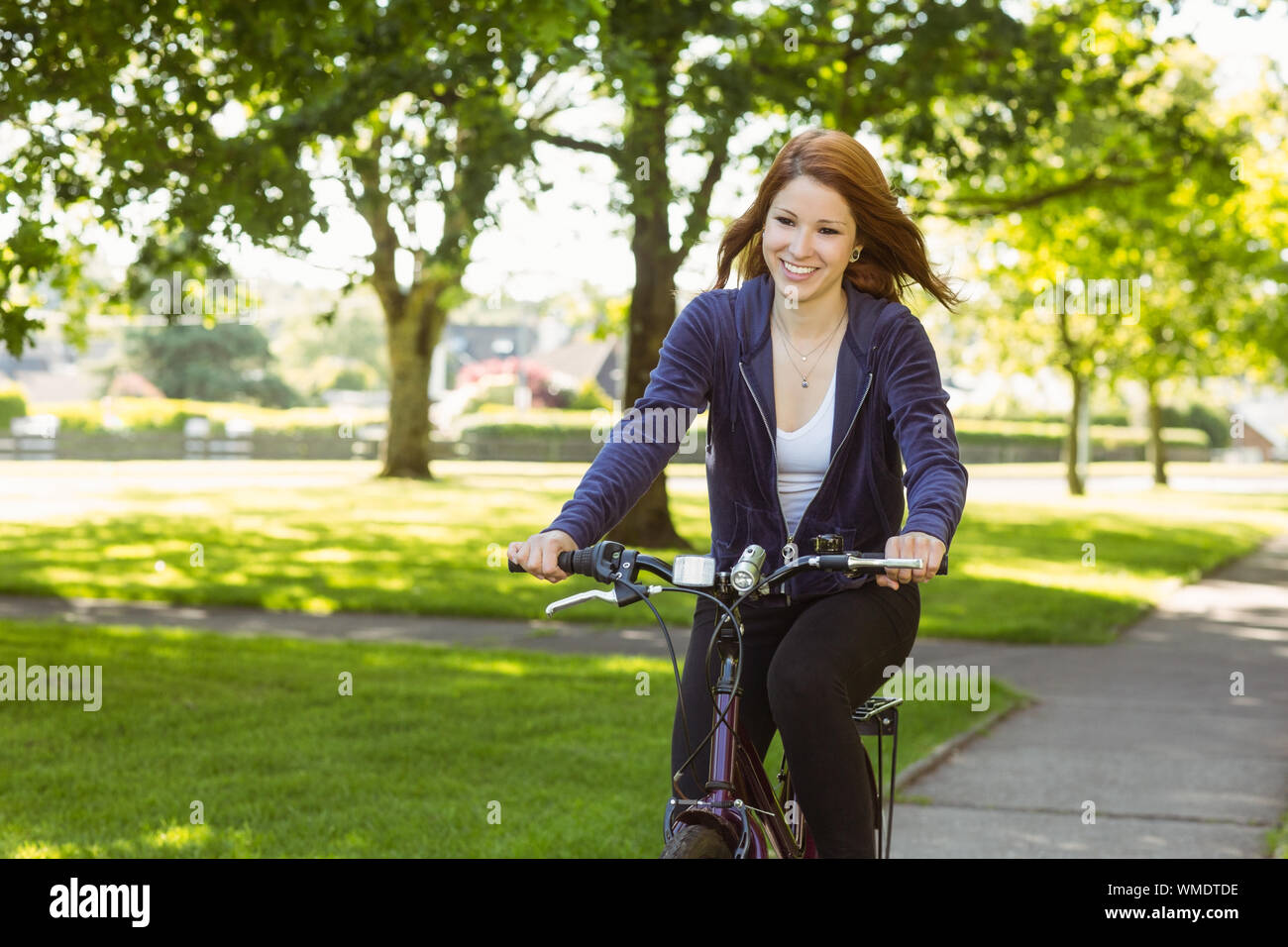 Cycling red hair hi-res stock photography and images - Alamy