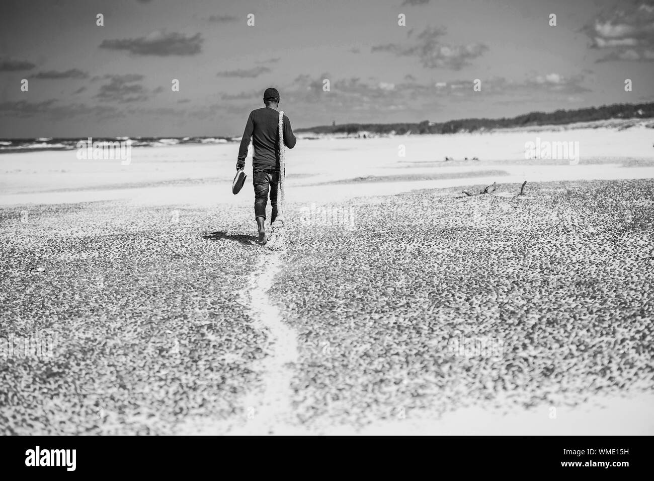 African man walking rear view Black and White Stock Photos & Images - Alamy