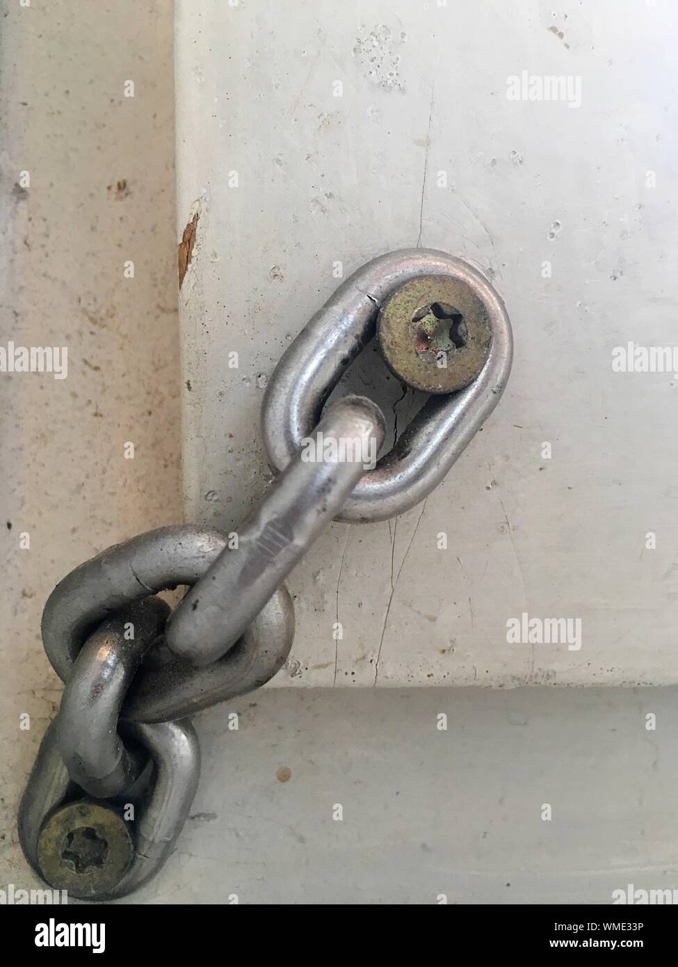 Chain on the wall hi-res stock photography and images - Alamy