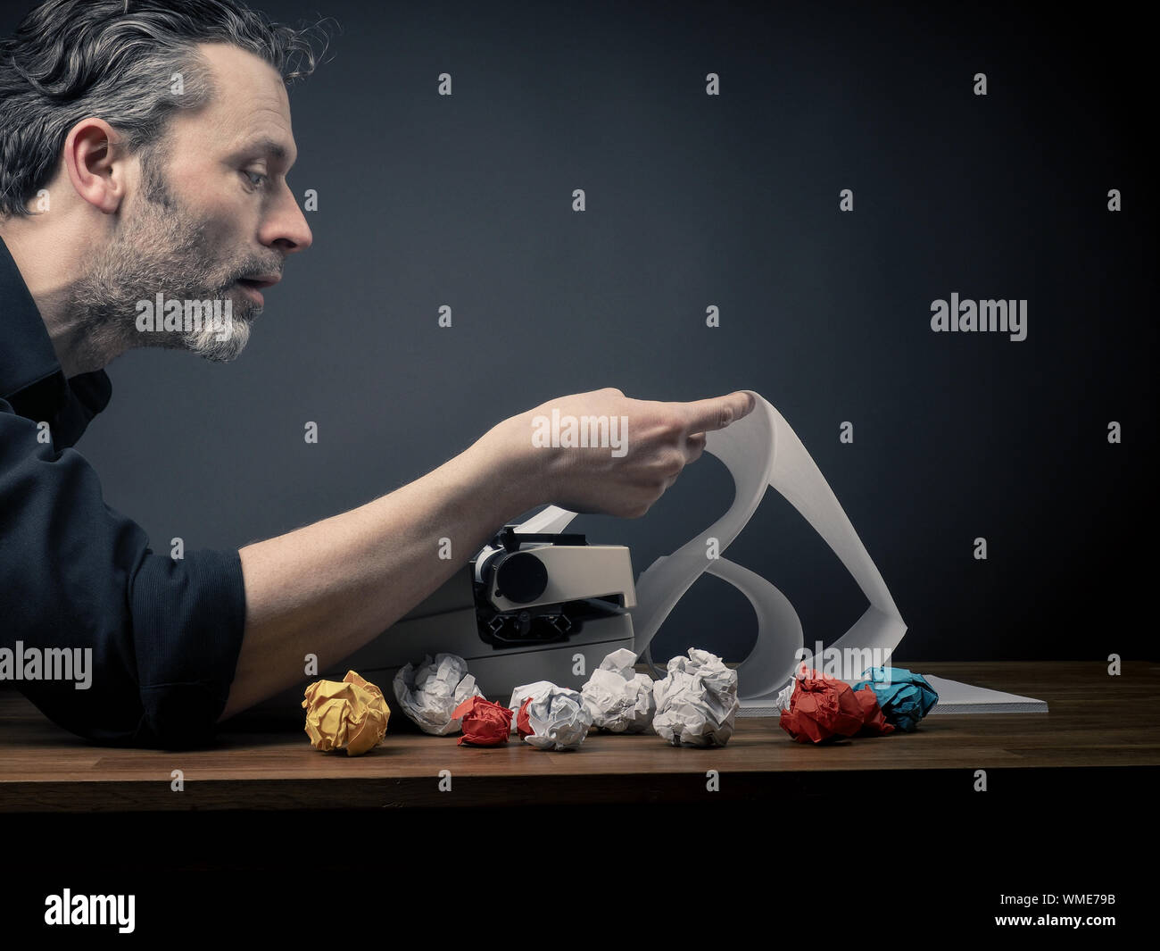 Holding typewriter hi-res stock photography and images - Alamy