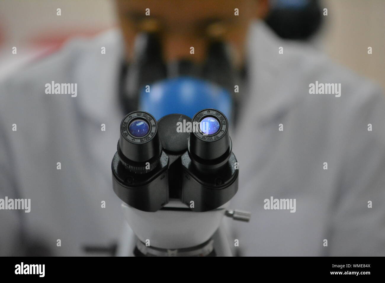 Microscope Scientist High Resolution Stock Photography and Images - Alamy