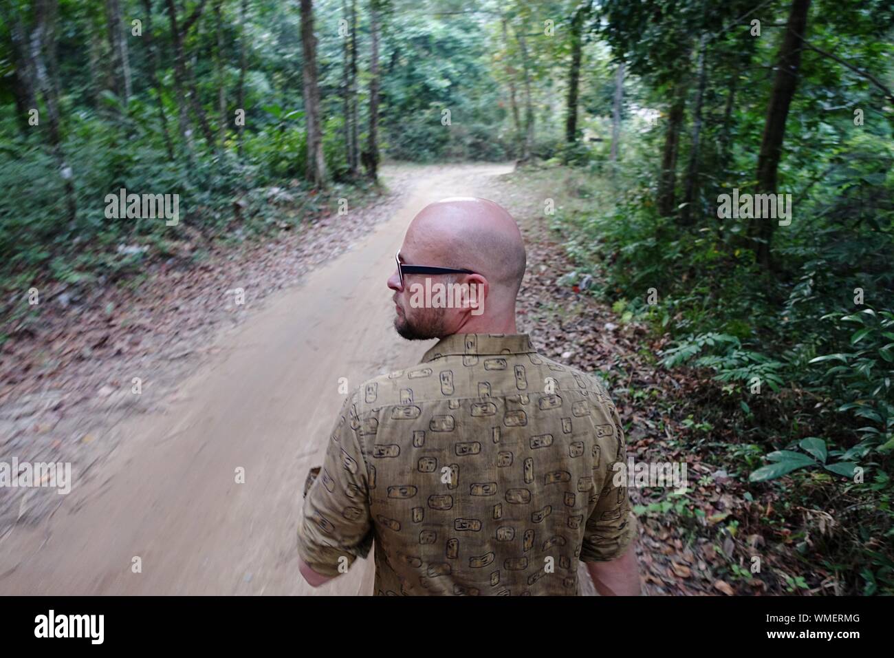 Bald man walking hi-res stock photography and images - Alamy