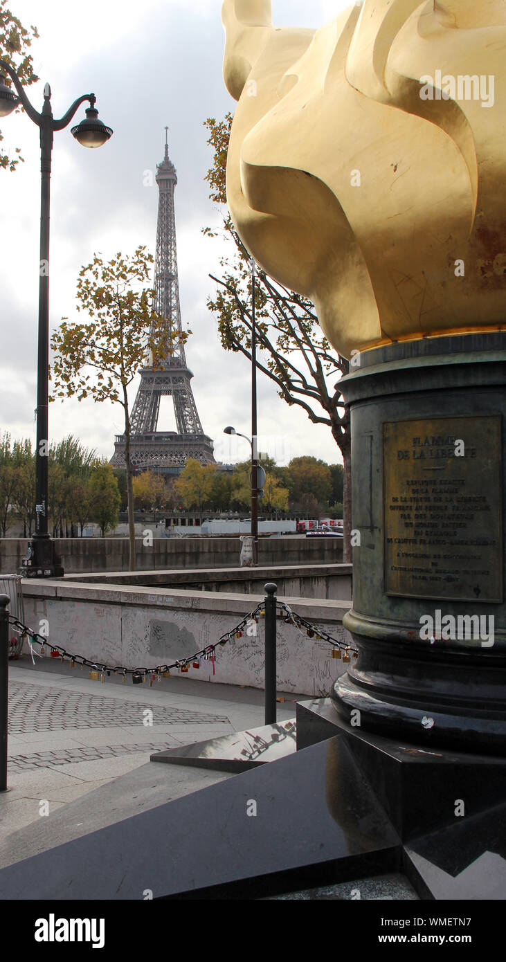 liberty fire and eiffel tower in paris (farnce Stock Photo - Alamy