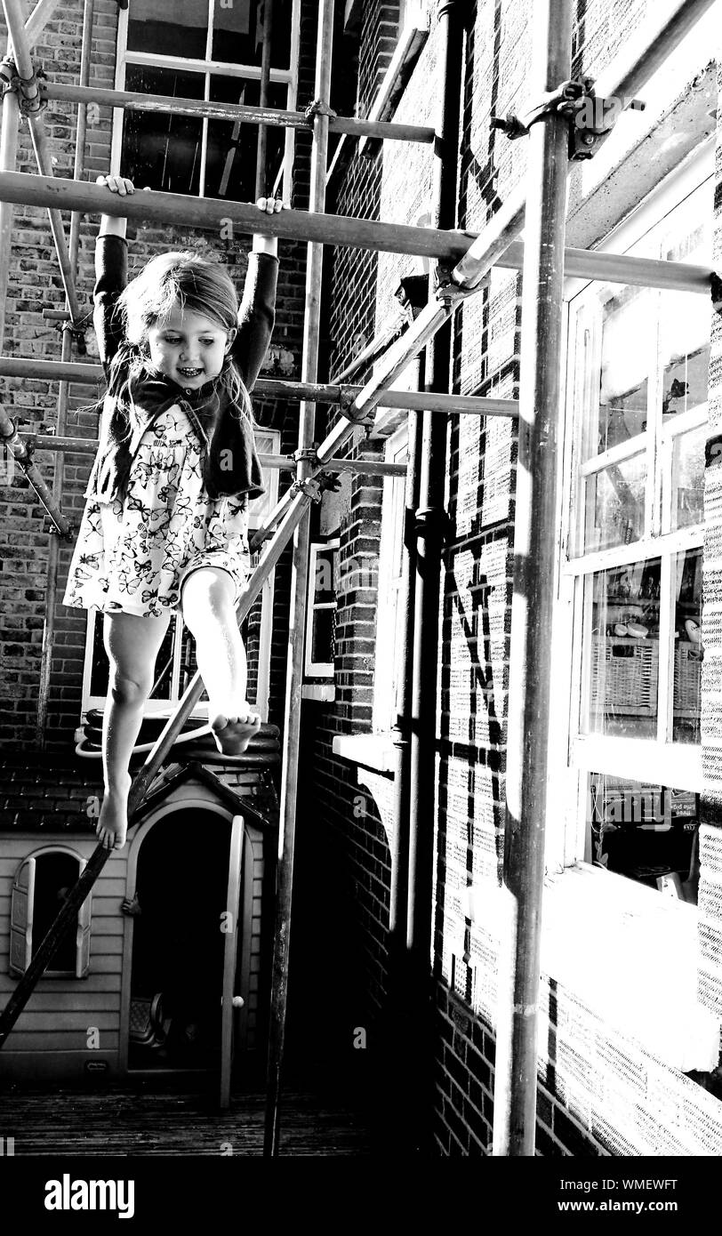 Hanging playful hi-res stock photography and images - Alamy