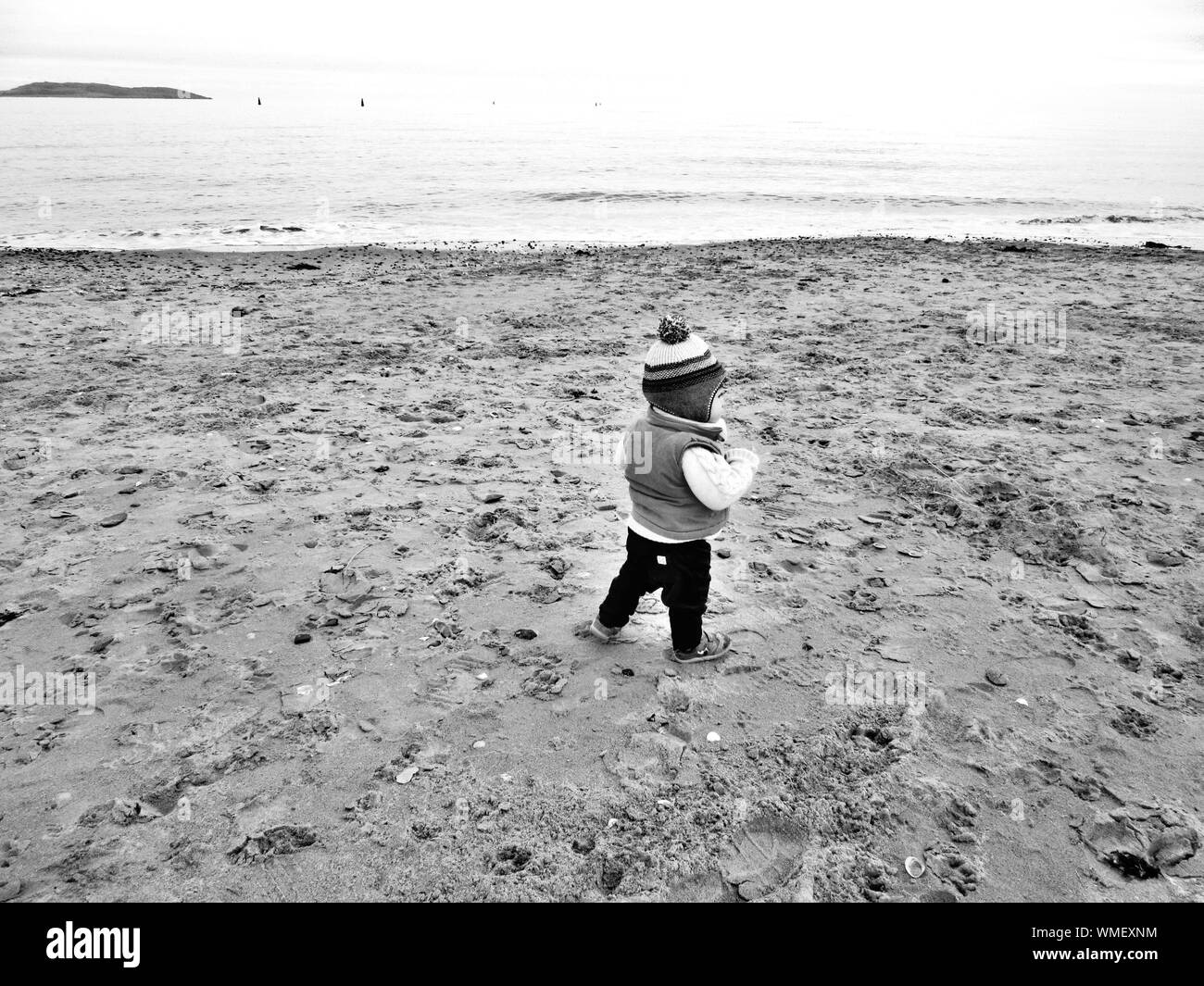 Boy standing rear view Black and White Stock Photos & Images - Alamy