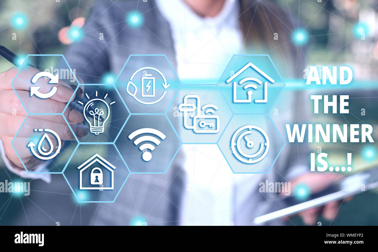 Handwriting text And The Winner Is. Conceptual photo announcing who got ...