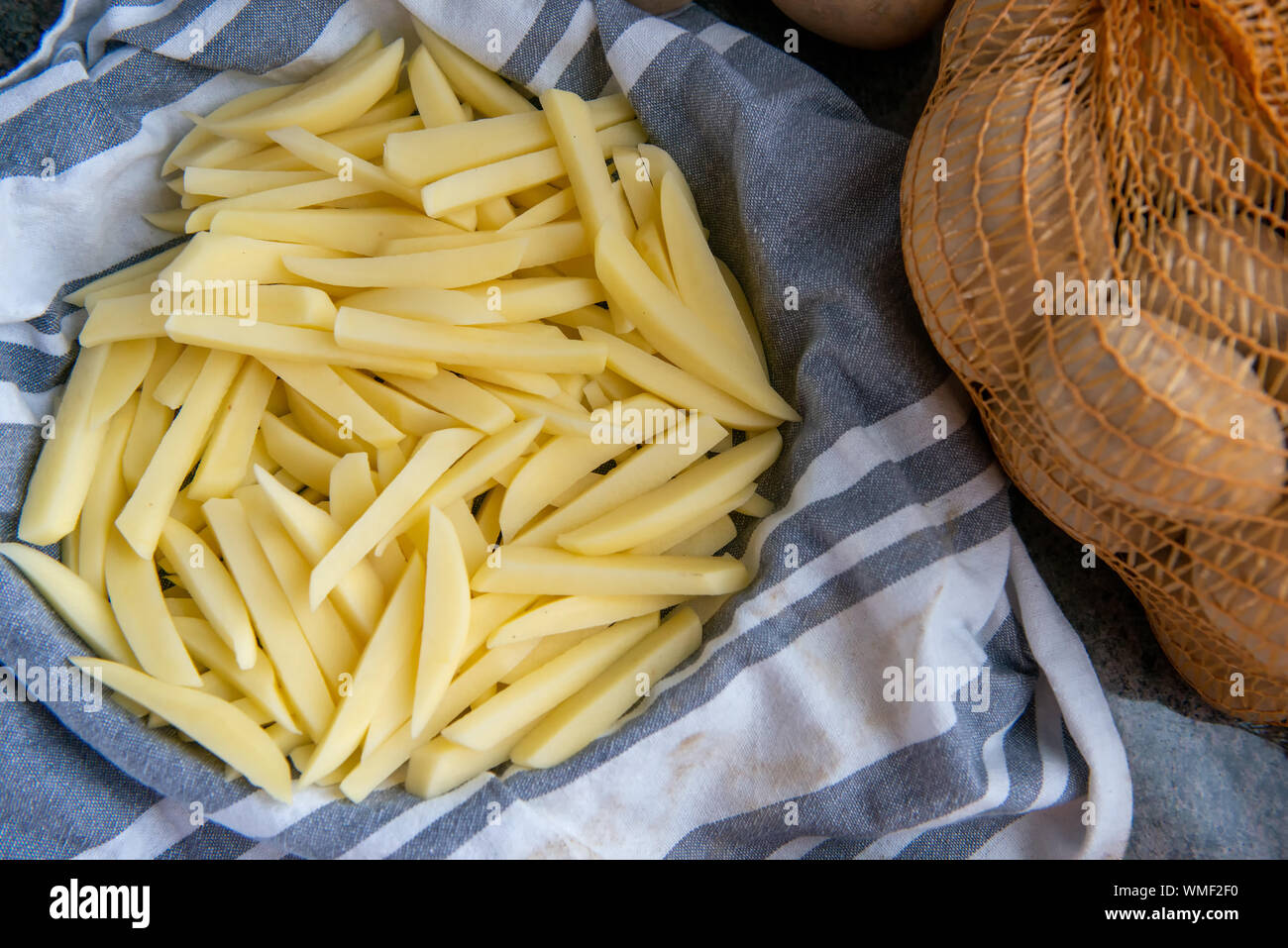 Raw french fries hi-res stock photography and images - Alamy