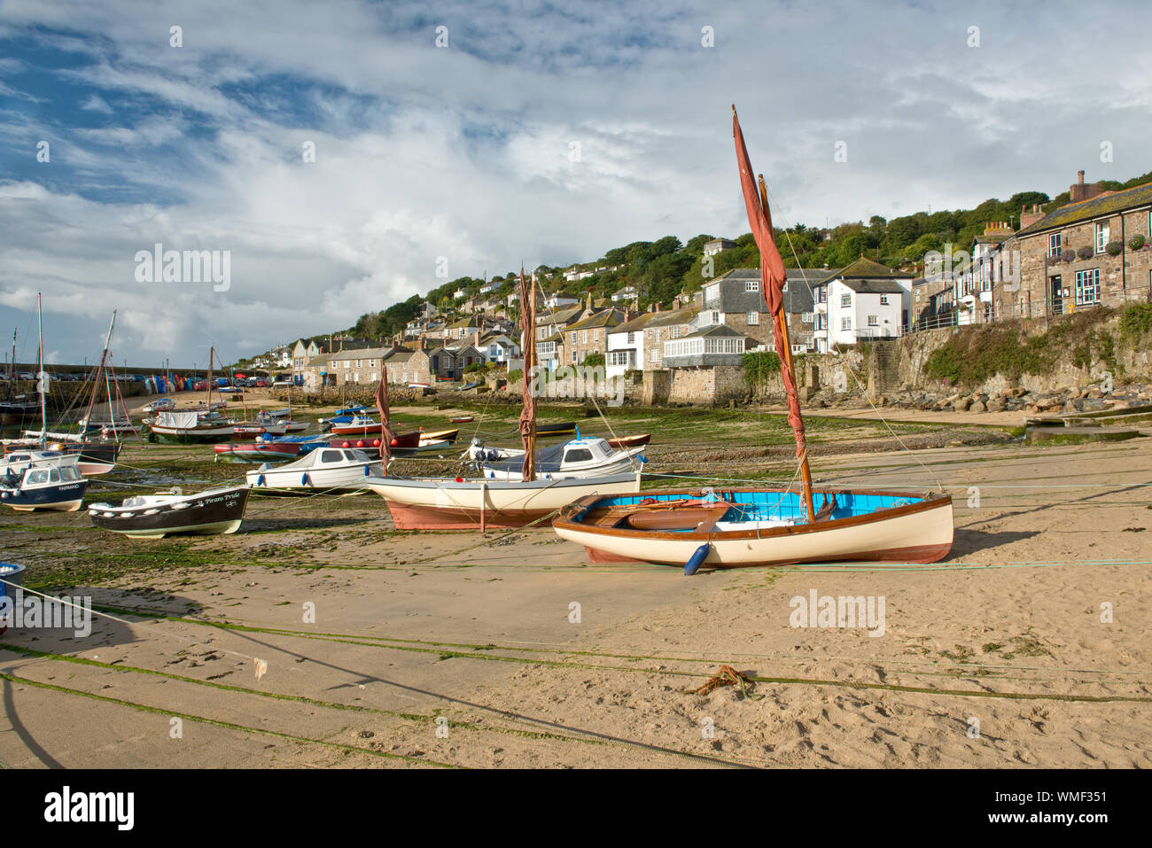 Mousehole fishing village at low tide. Cornwall, England, UK Stock ...