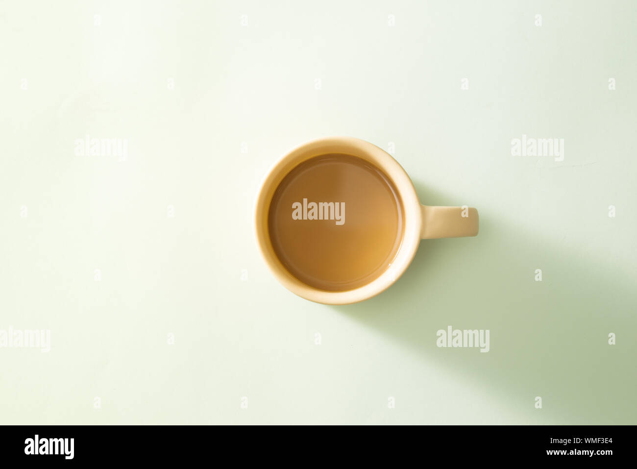 Cup of coffee on the light background Stock Photo - Alamy