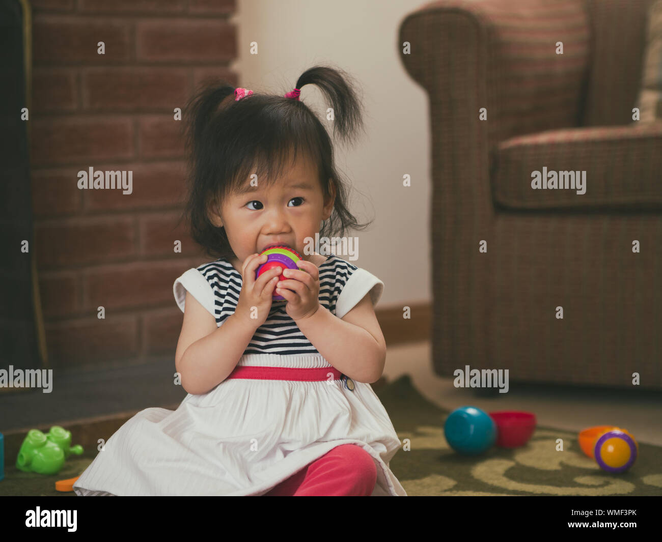 Baby biting toy hi-res stock photography and images - Alamy