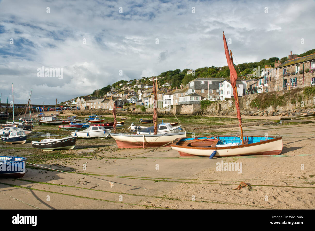 Mousehole fishing village at low tide. Cornwall, England, UK Stock ...