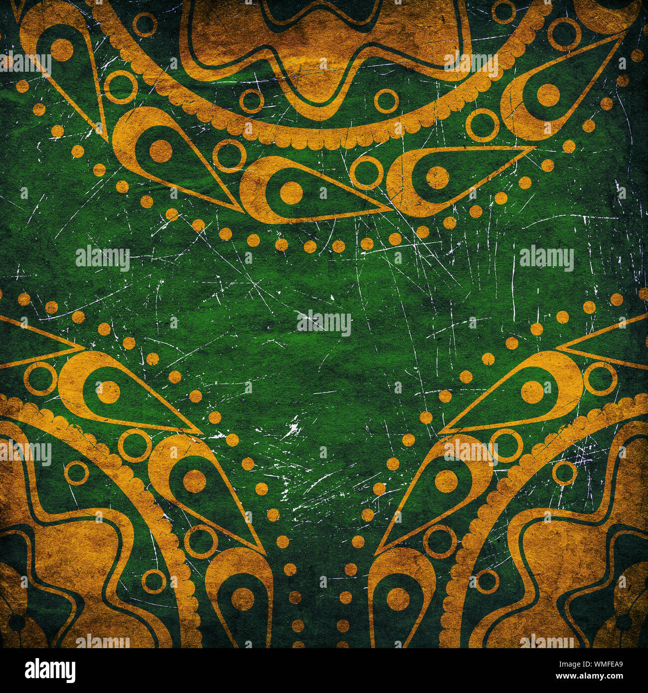 Abstract yellow ornament on grunge green background Stock Photo - Alamy