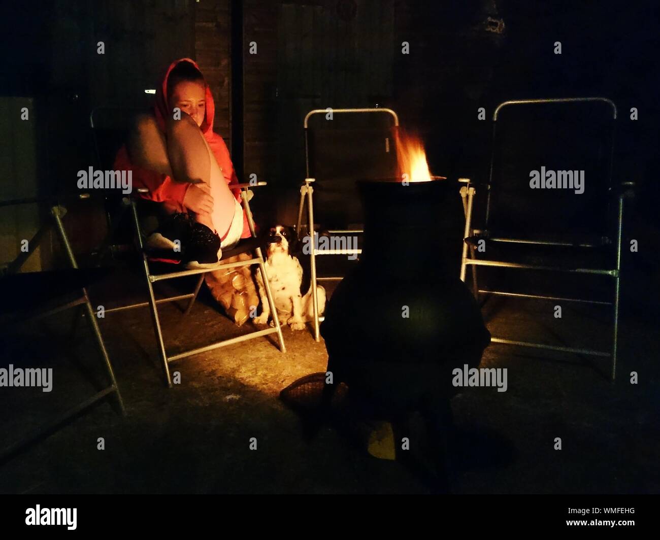 Hugging fire hi-res stock photography and images - Alamy