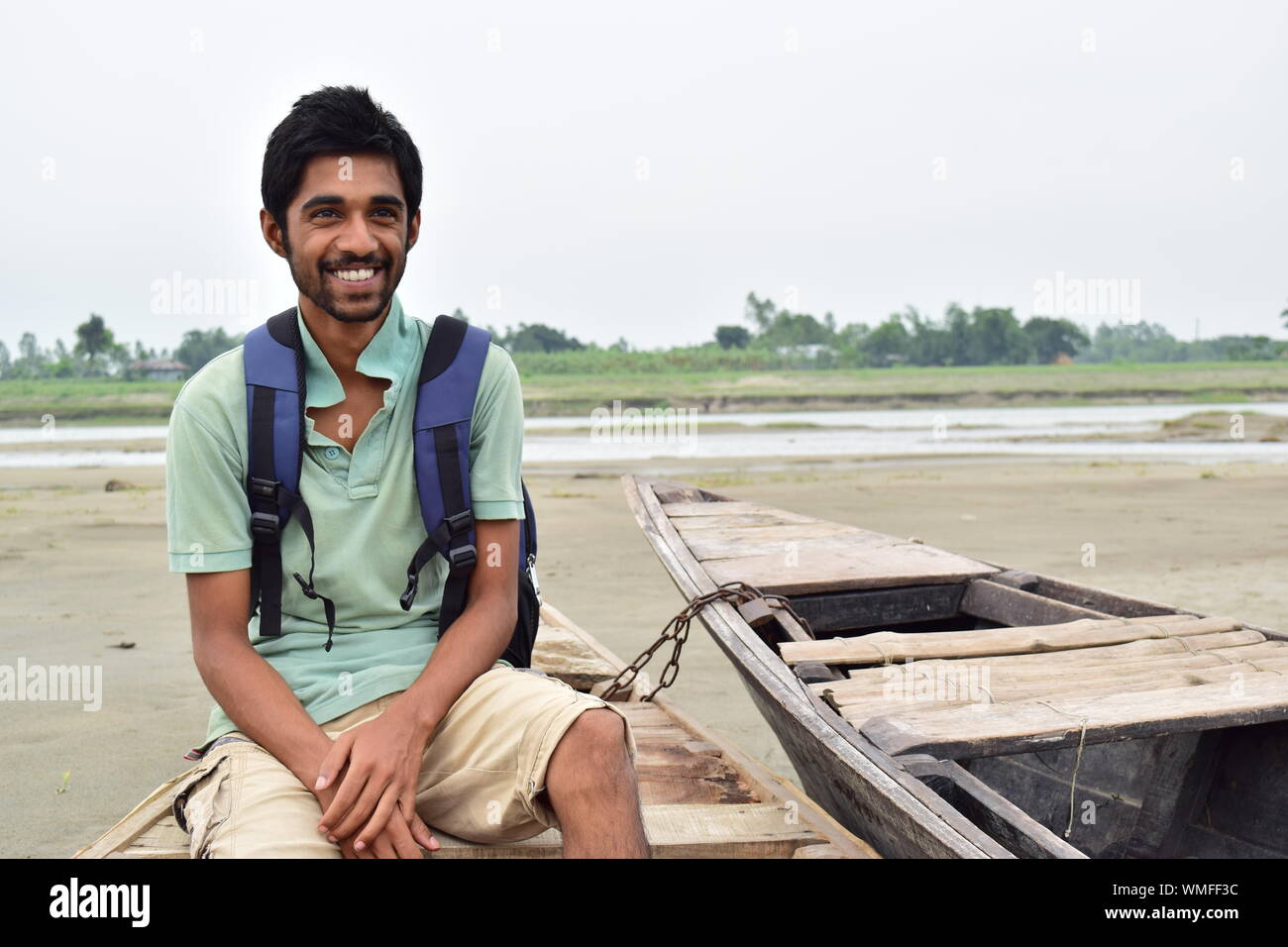 Indian man sitting on boat hi-res stock photography and images - Alamy
