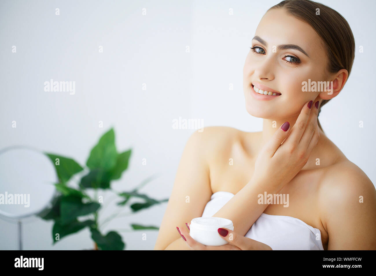 Beauty and Care. Young Girl with Cream for Face. Beautiful Woman With ...