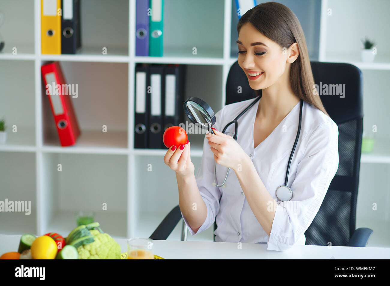 Health. The doctor signs out a diet plan. The Dietitian Holds in the ...