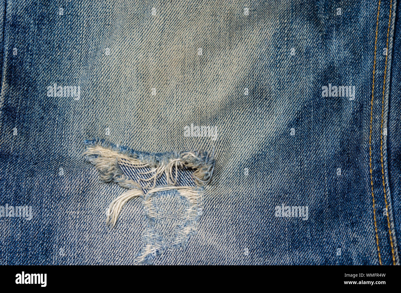 Torn thread hi-res stock photography and images - Alamy