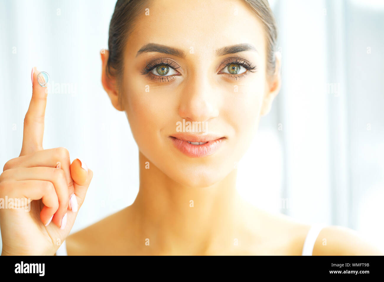 Vision Contact Lenses. Closeup With Beautiful Woman Face Stock Photo ...