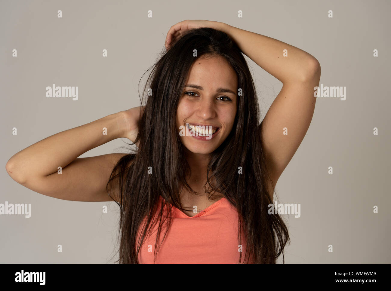Close up portrait of young beautiful latin woman with happy face, beautiful smile and long ...