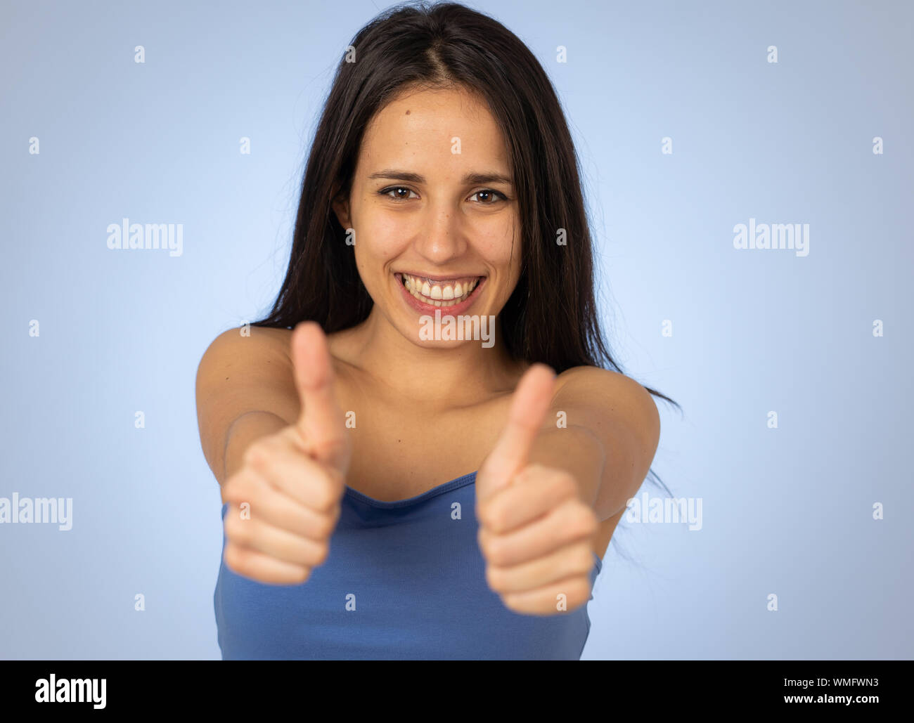 Teenage girl thumbs up ok hi-res stock photography and images - Alamy