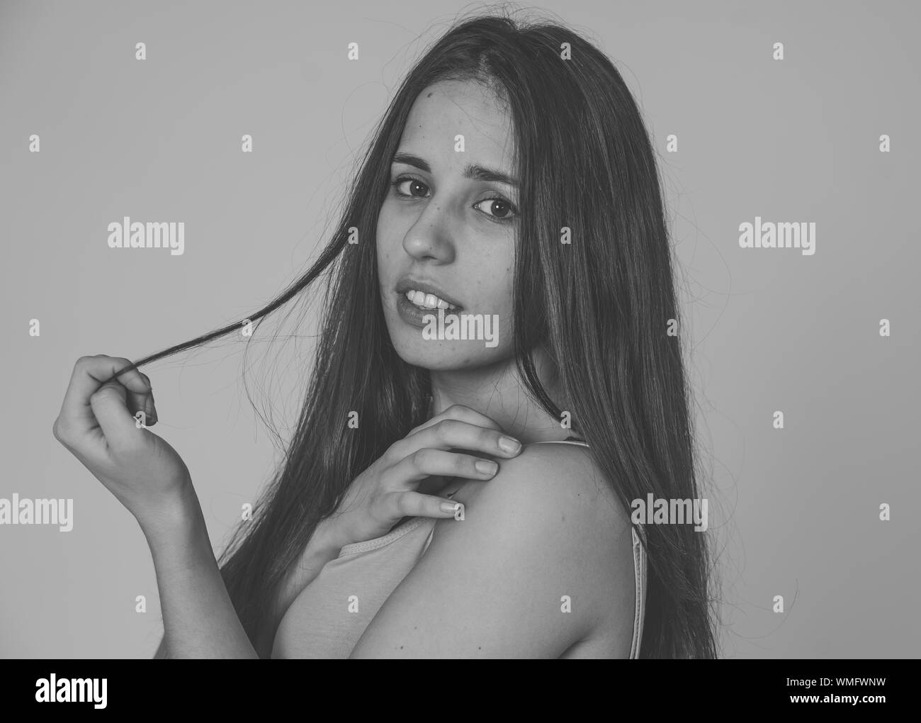 Close Up Portrait Of Young Beautiful Latin Woman With Happy Face