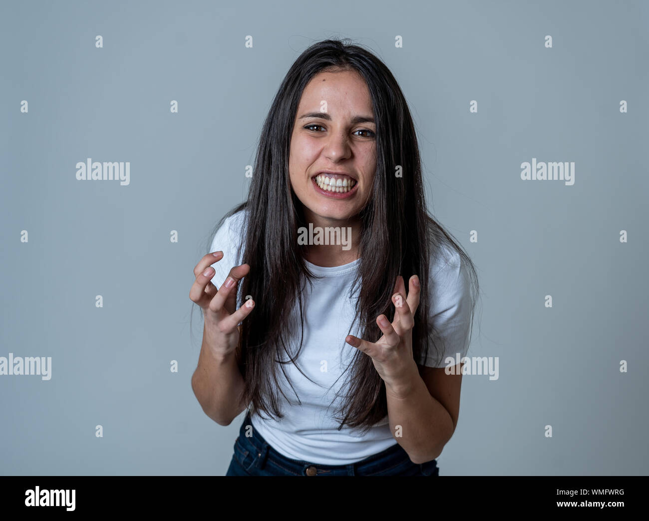 Close up of young attractive frustrated latin woman in stress with ...